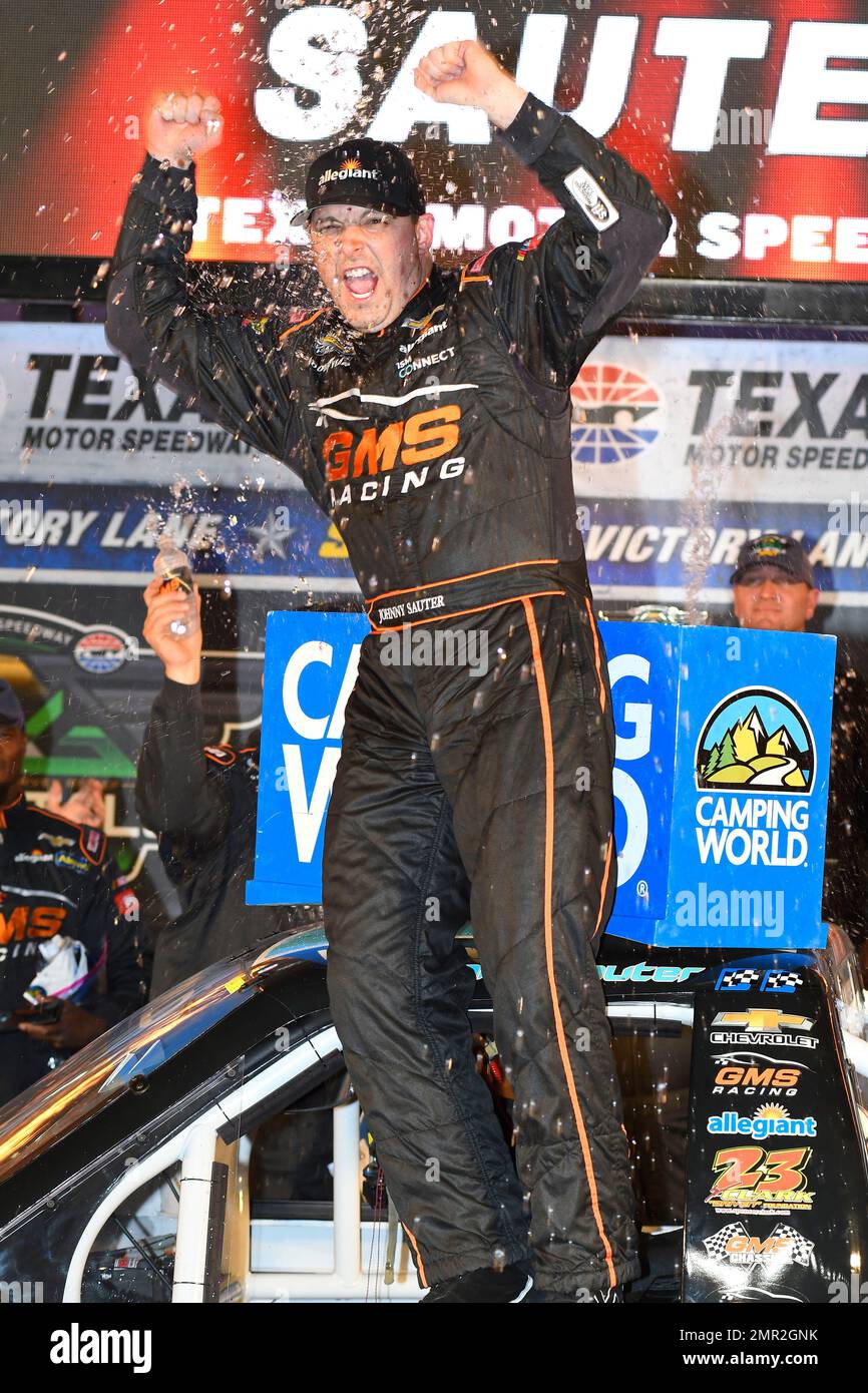 Johnny Sauter celebrates winning the NASCAR Truck Series auto race at ...