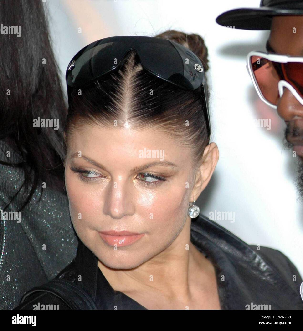 Fergie shows she is back in business and back in shape during her ...