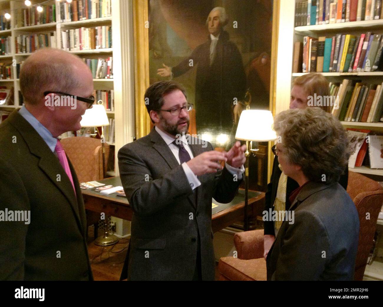 Jon Parrish Peede, center, acting head of the National Endowment for ...