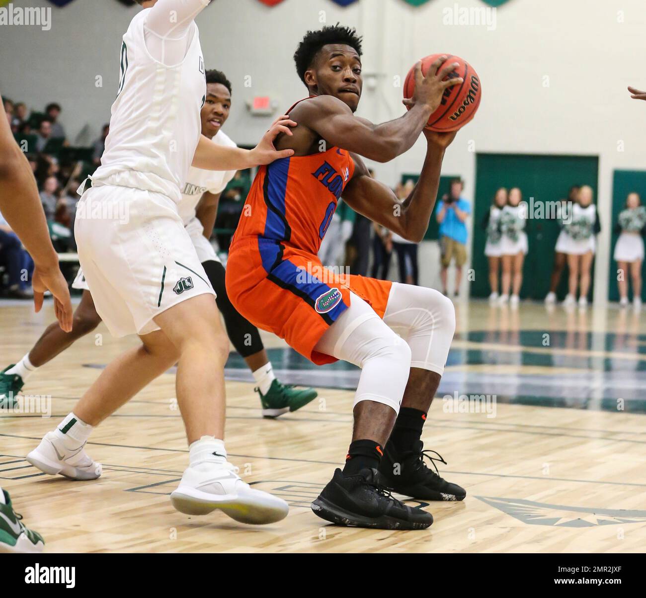 Florida guard Mike Okauru (0) during the first half of an NCAA men's ...