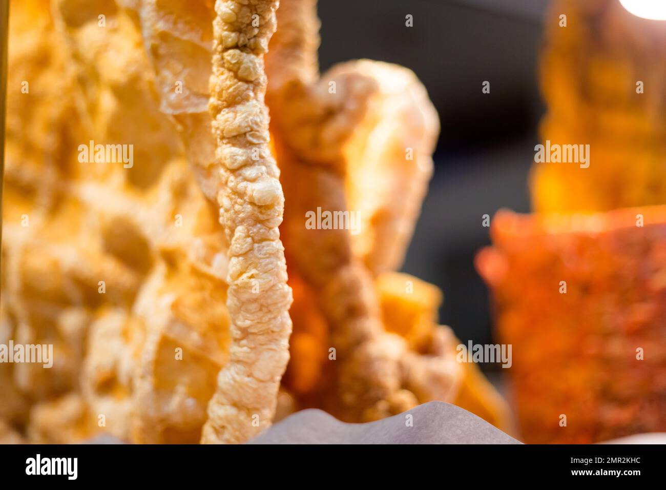 Fresh prepared pork belly skin chicarron served in local market in ...
