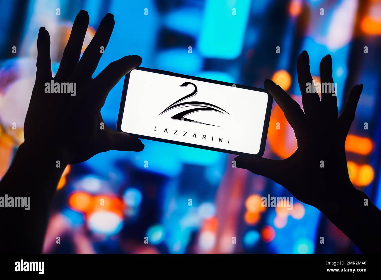 In this photo illustration, the Lazzarini Design Studio logo is ...