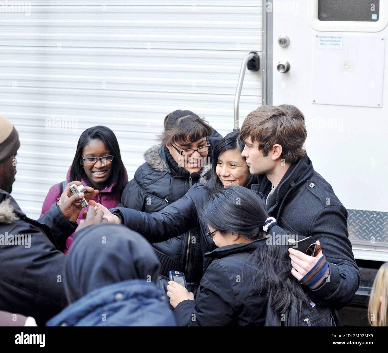 Exclusive!! Chace Crawford greets fans during a filming break on the ...