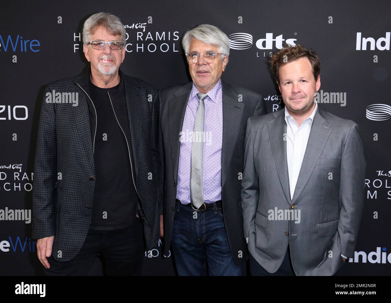 Trevor Albert, from left, Andrew Alexander and Jack Newell arrive at ...