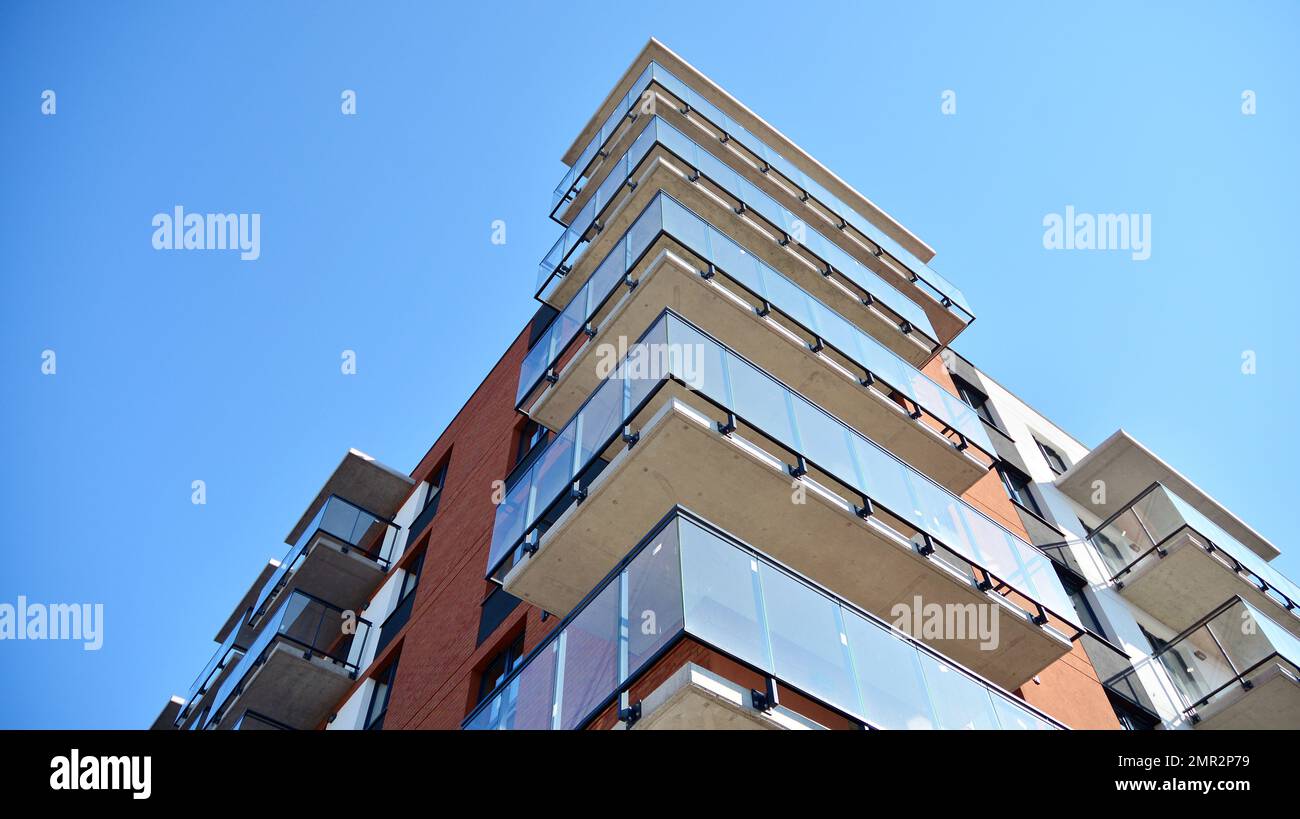 Futuristic square architecture of apartment building. Real estate with ...