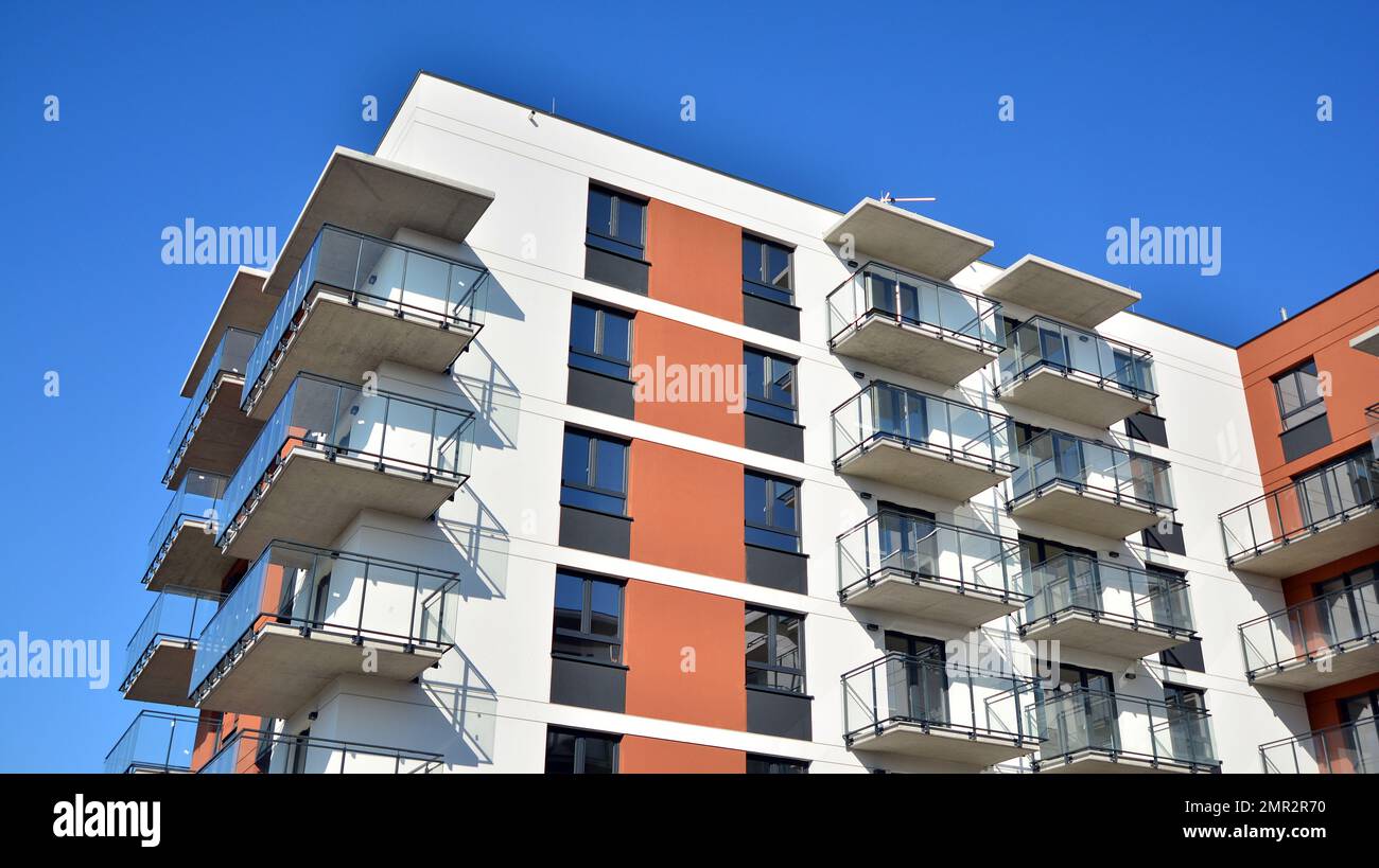 Futuristic square architecture of apartment building. Real estate with ...