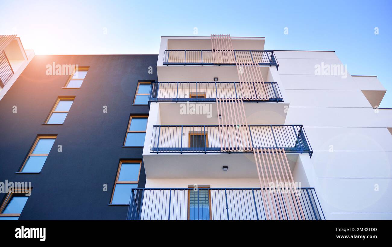 Futuristic square architecture of apartment building. Real estate with ...