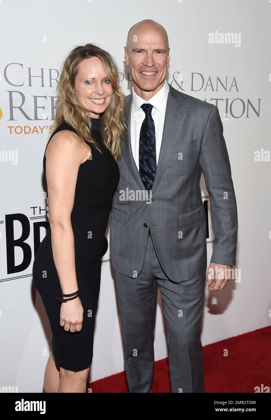 Mark Messier, right, and Kim Clark attend the Samsung Charity Gala at ...
