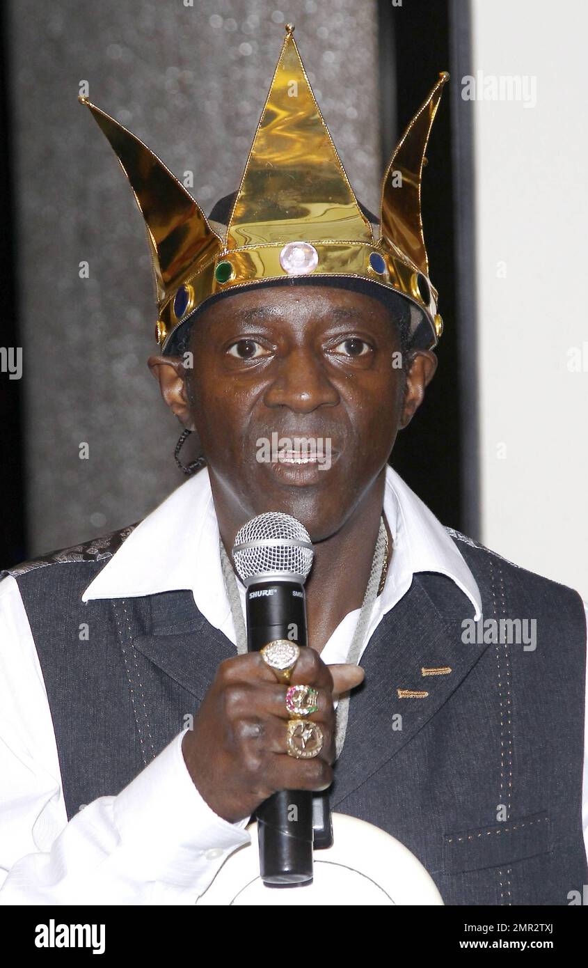 Flavor Flav signs his new book, "Flavor Flav The Icon The Memoir", at ...