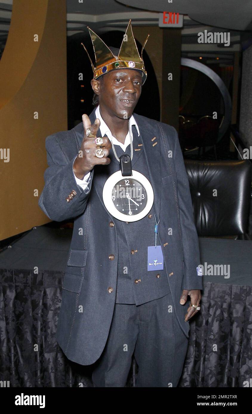 Flavor Flav signs his new book, "Flavor Flav The Icon The Memoir", at ...