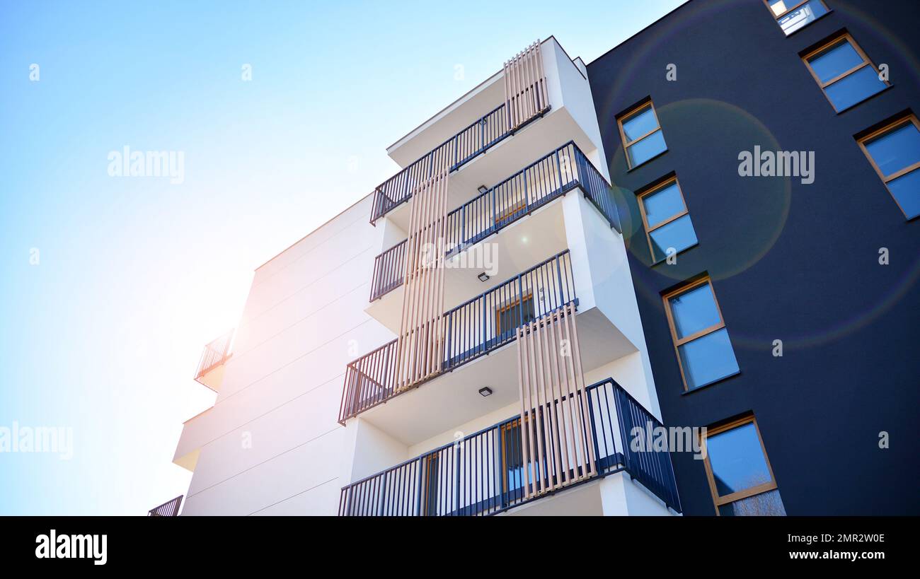 Futuristic square architecture of apartment building. Real estate with ...