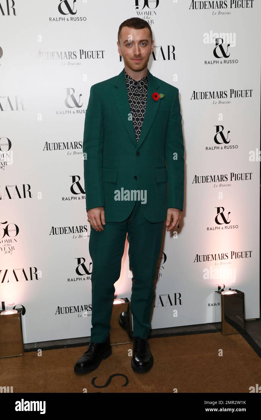 Singer Sam Smith poses for photographers on arrival at the Harpers ...