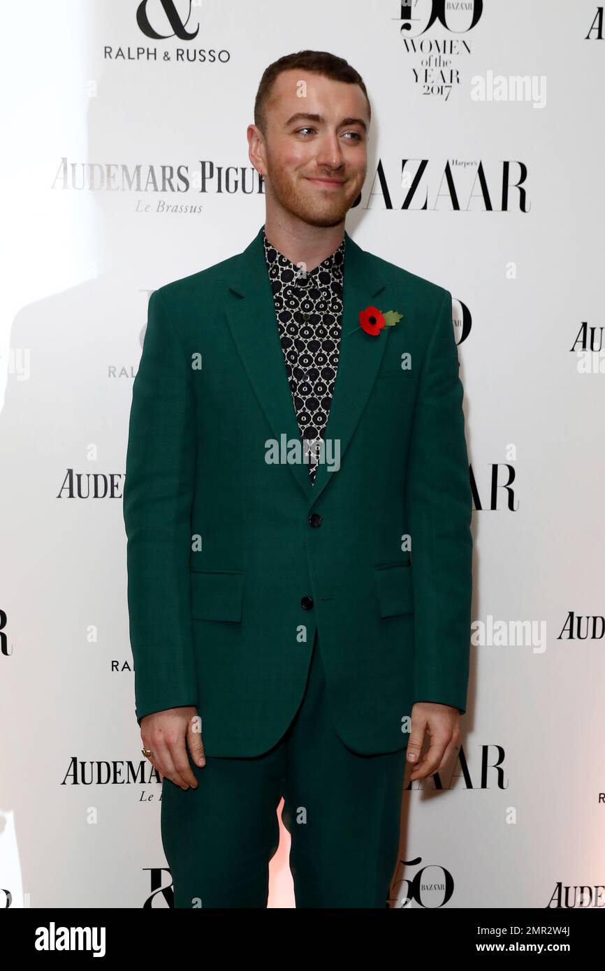 Singer Sam Smith poses for photographers on arrival at the Harpers ...