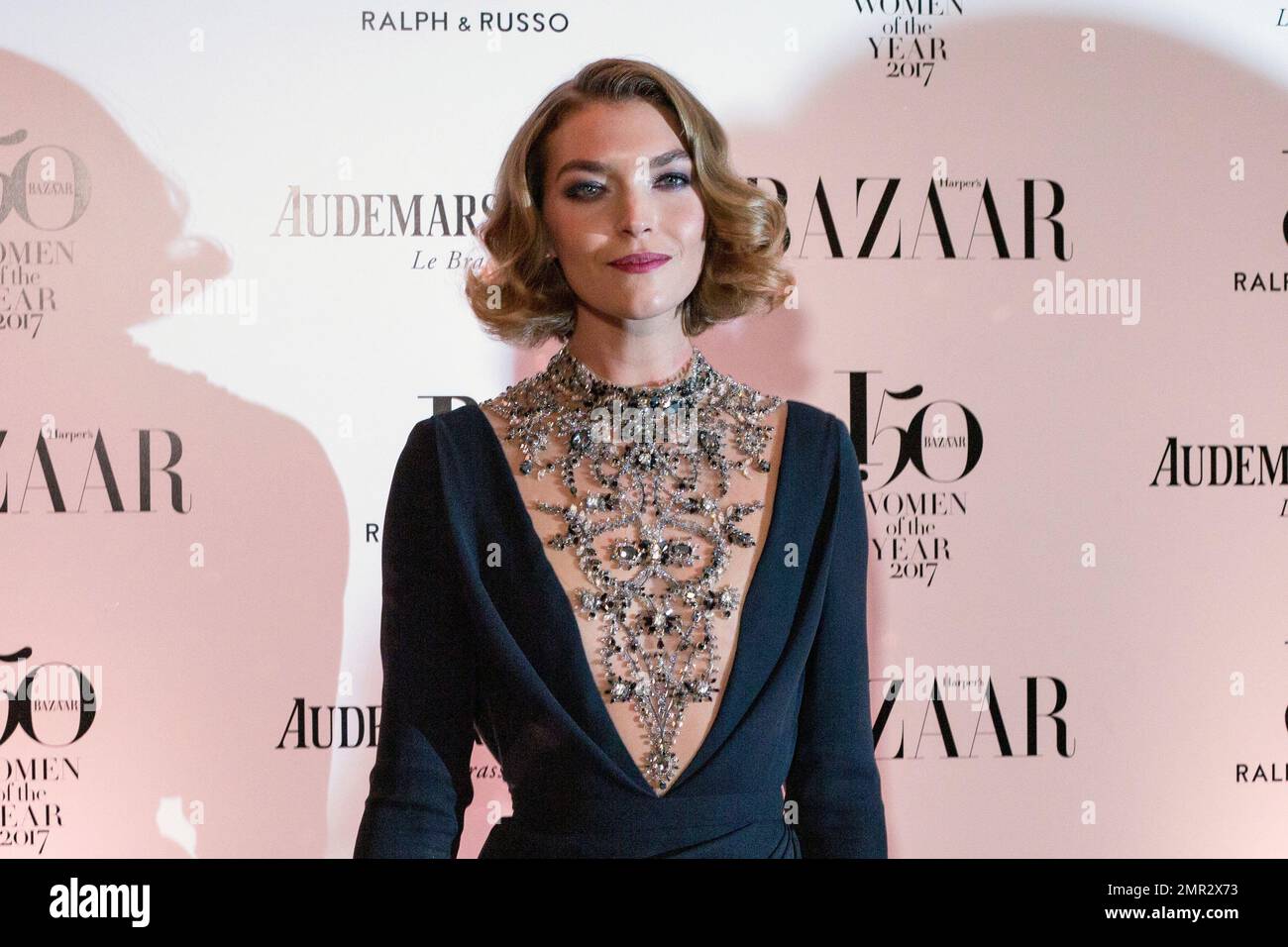 Model Arizona Muse poses for photographers on arrival at the Harpers ...