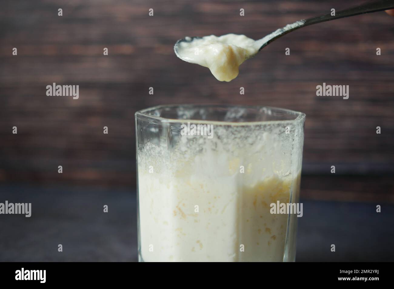 glass of whole cream milk on table , Cream of milk Stock Photo - Alamy