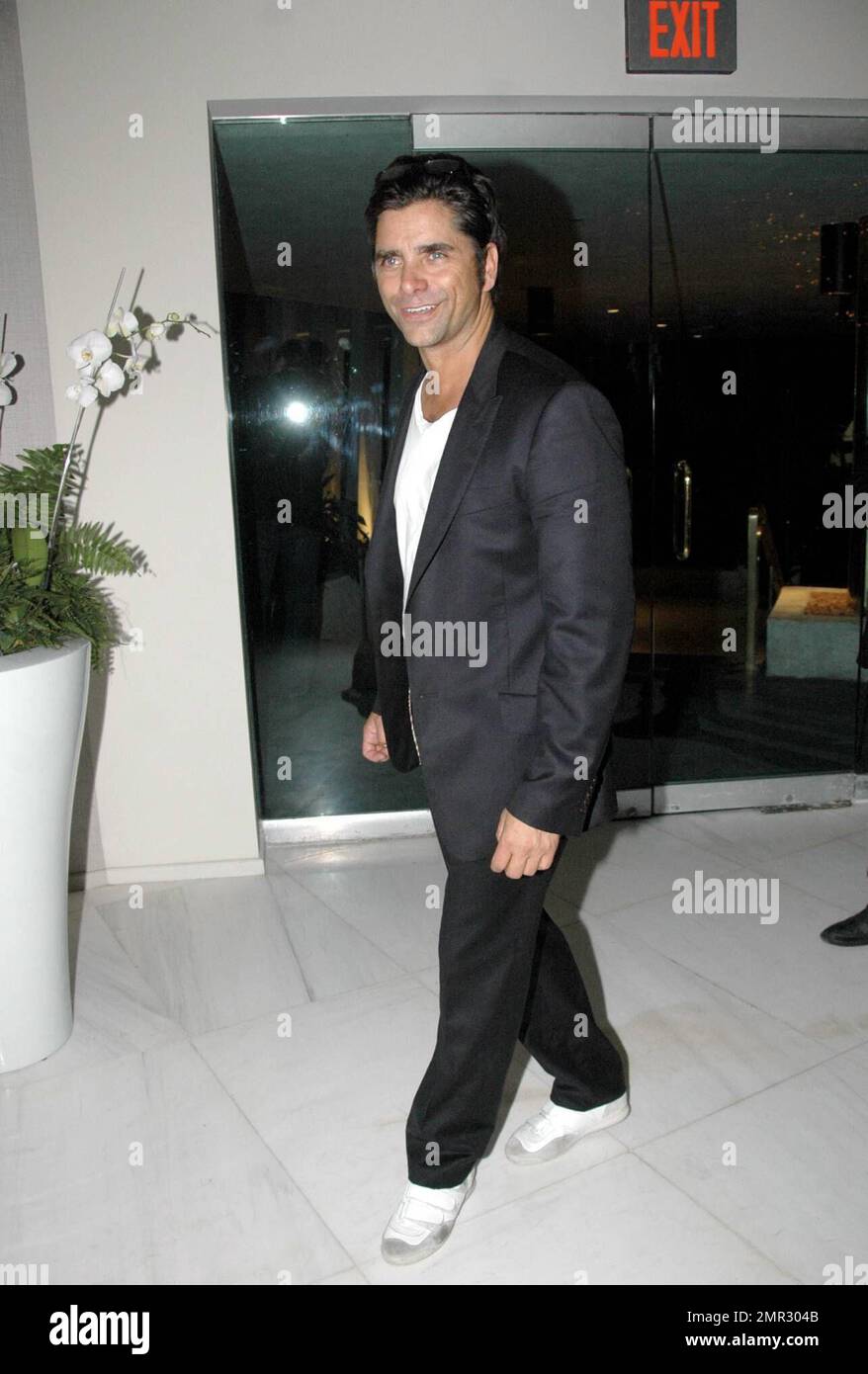 John Stamos attends the Victoria's Secret Fashion Show during the grand ...