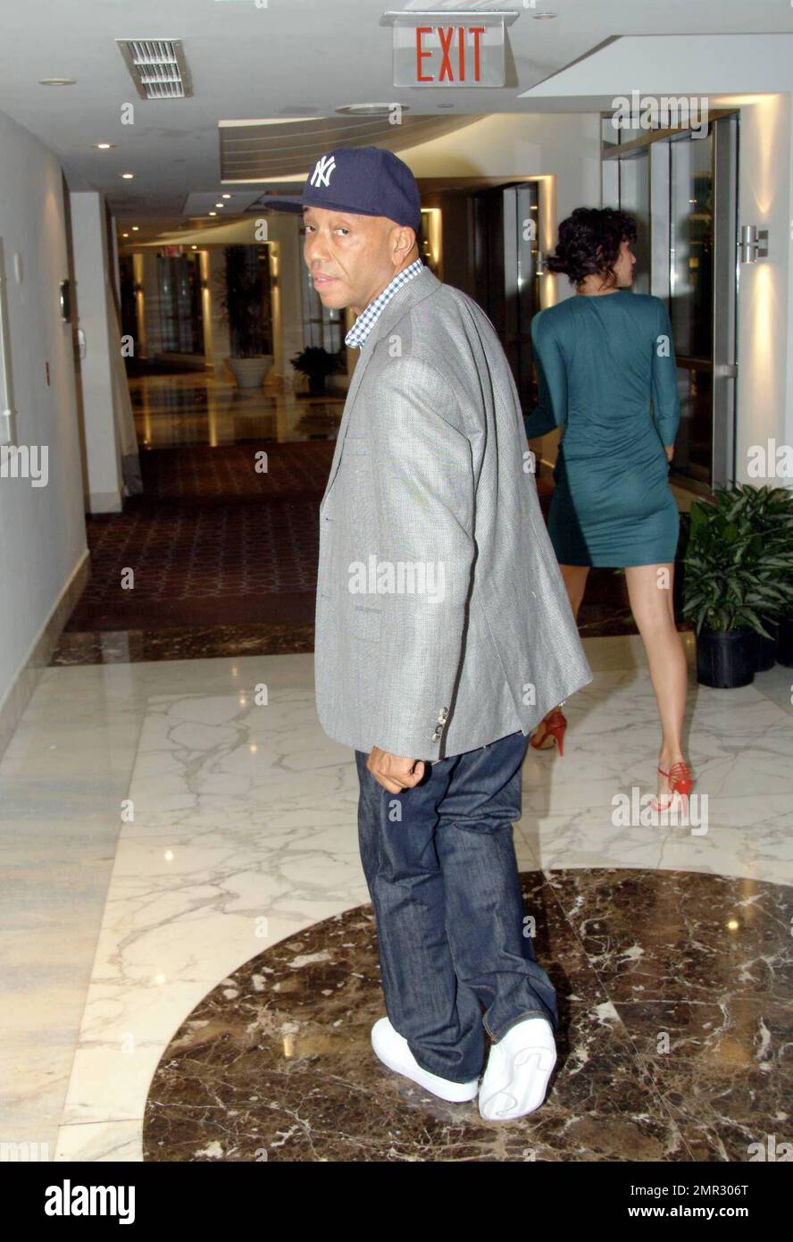 Exclusive!! Hip hop mogul Russell Simmons attends the Grand Re-Opening ...