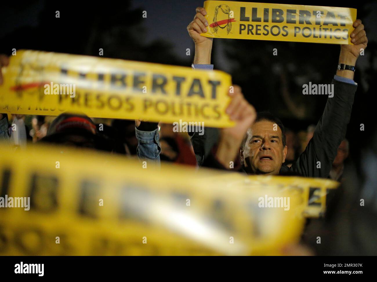 Demonstrators gather outside the Catalonian Parliament to protest ...
