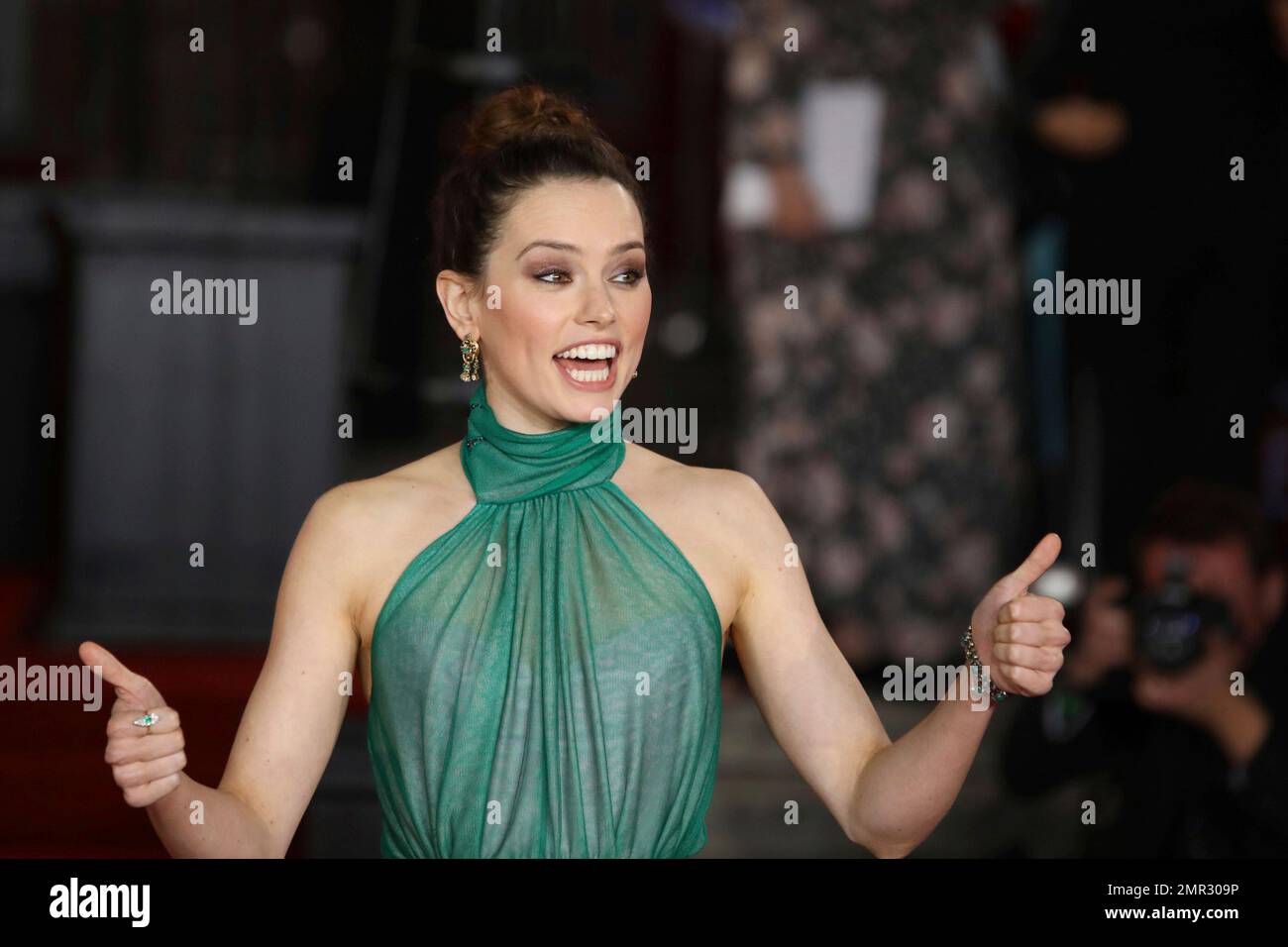 Actress Daisy Ridley poses for photographers upon arrival at the World ...