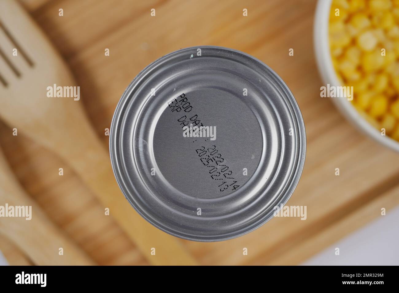 expire date on food can on white background Stock Photo - Alamy