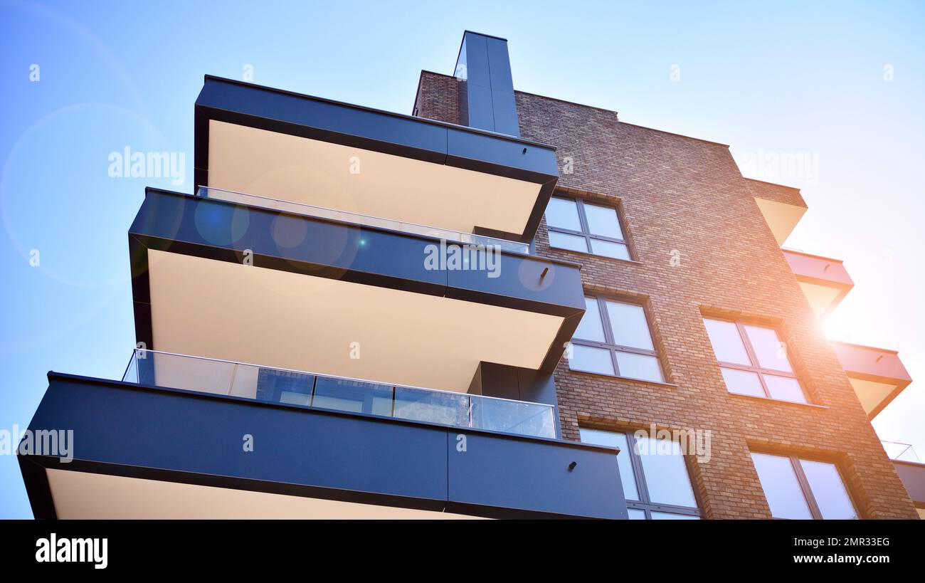 Futuristic square architecture of apartment building. Real estate with ...
