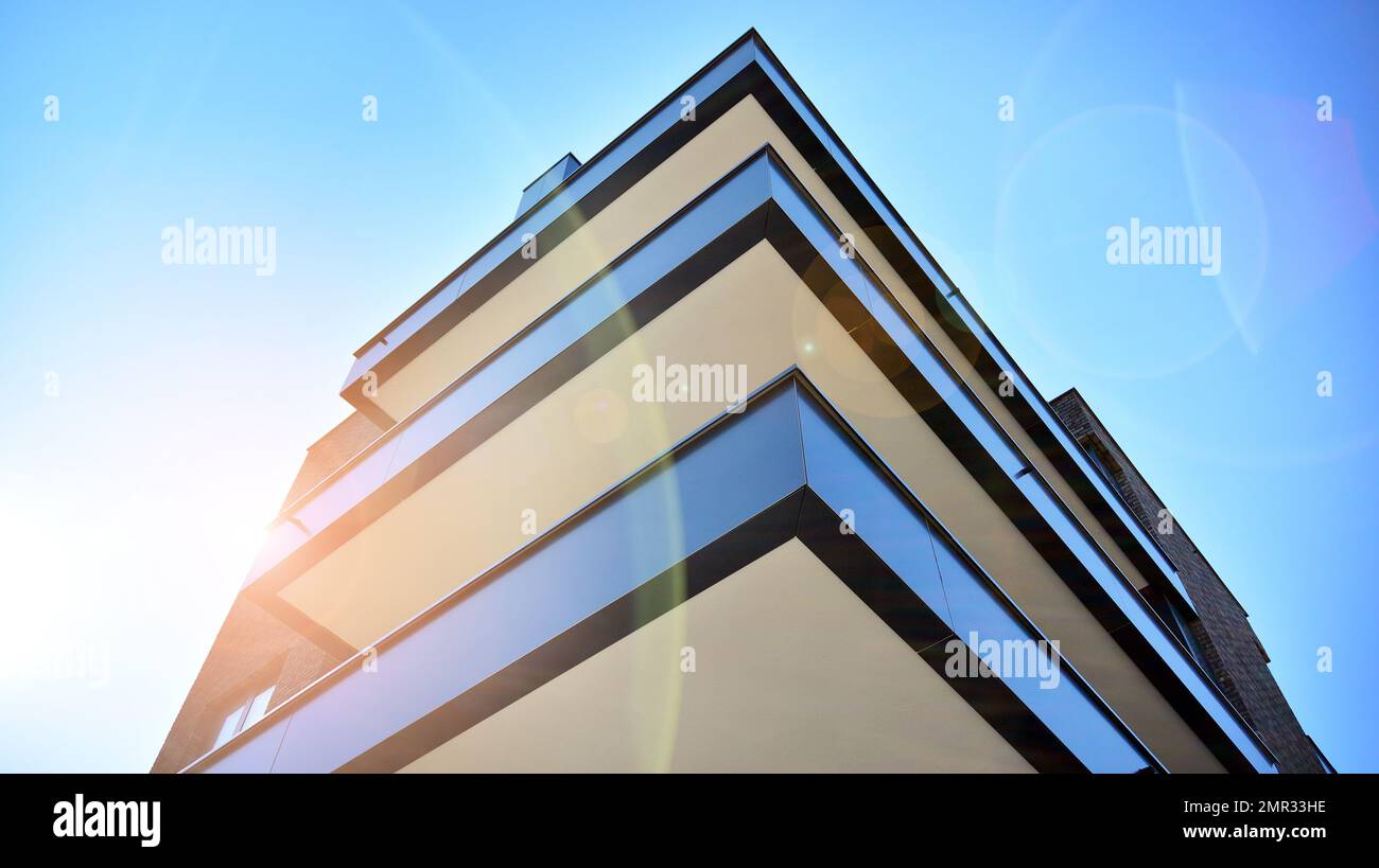 Futuristic square architecture of apartment building. Real estate with ...