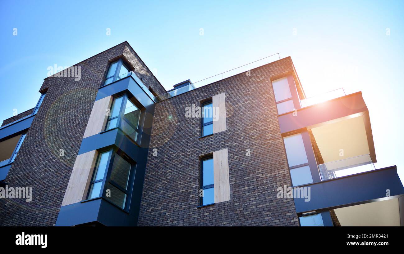 Futuristic square architecture of apartment building. Real estate with ...