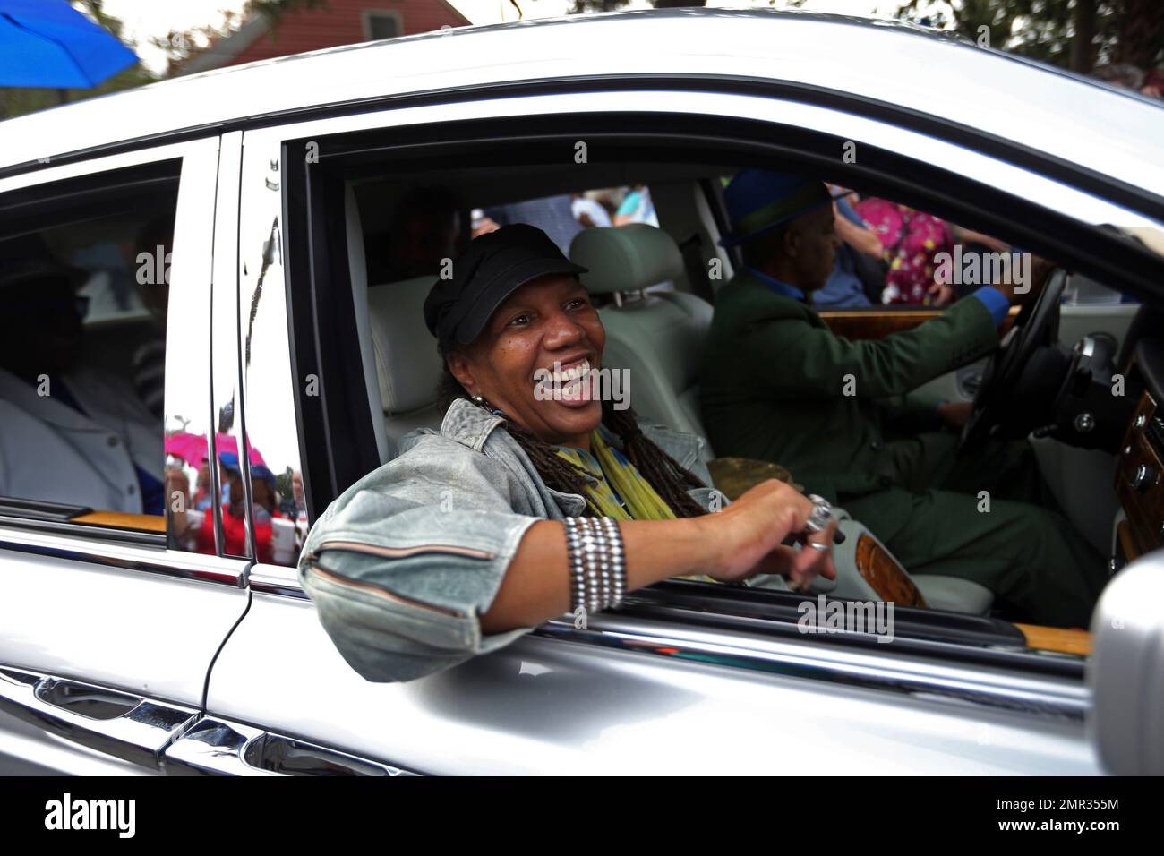 New Orleans singer Charmaine Neville rides in a Rolls-Royce during a ...