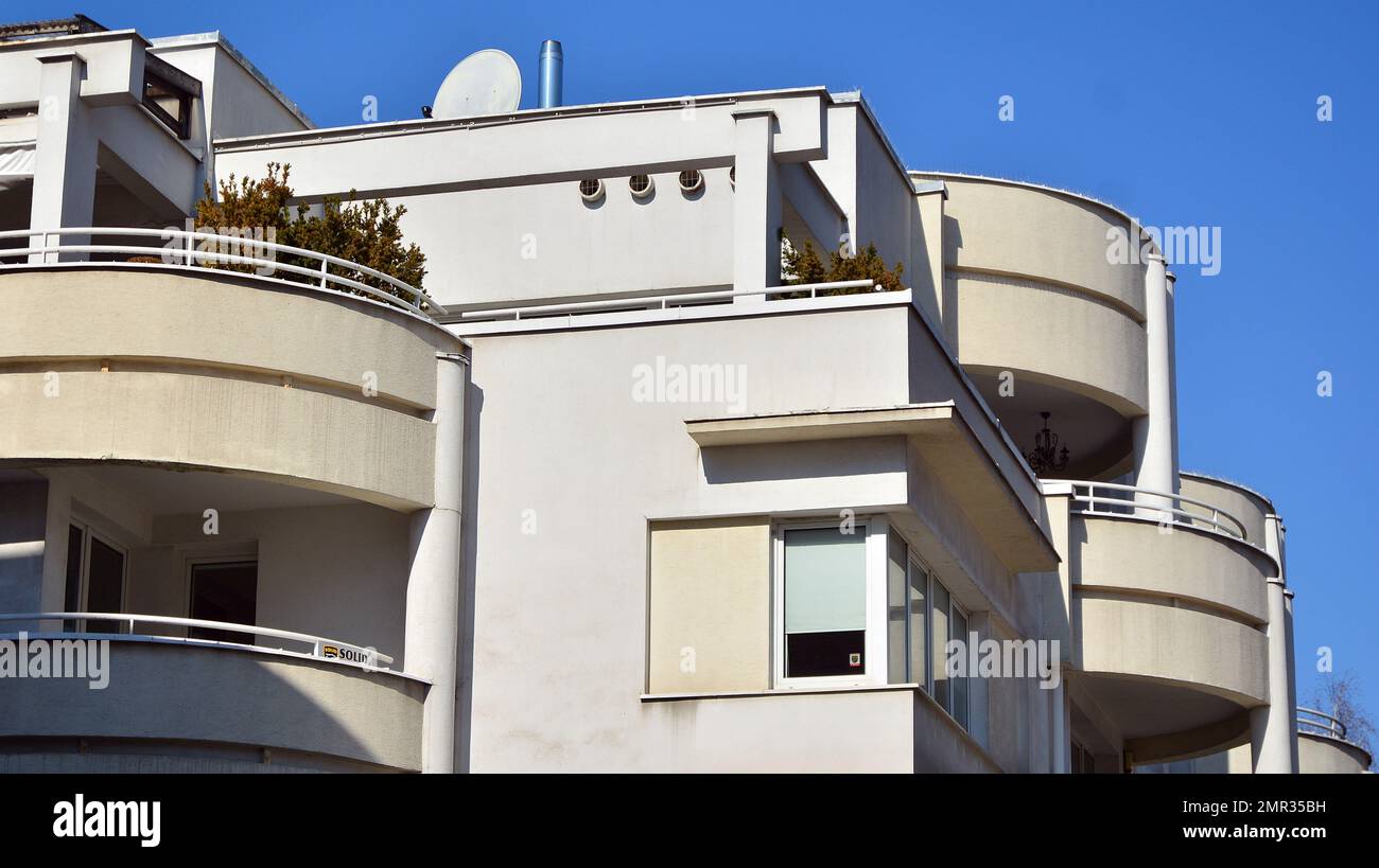 Futuristic square architecture of apartment building. Real estate with ...