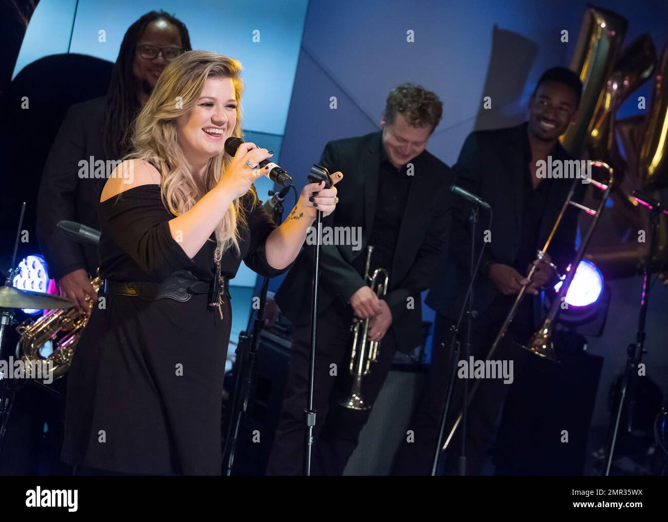Singer Kelly Clarkson performs at a fan event celebrating the release ...