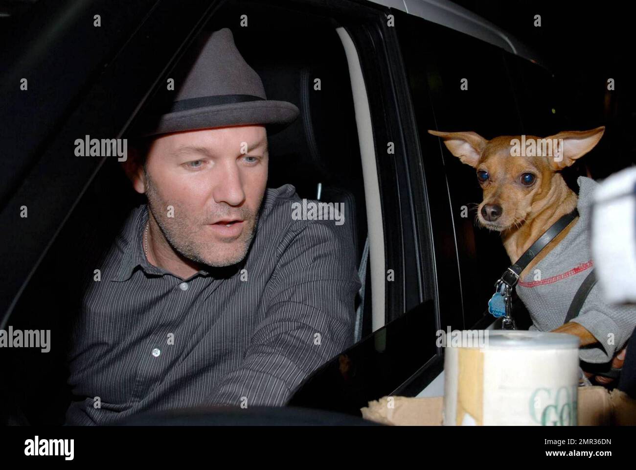 Limp Bizkit frontman Fred Durst looks deep in thought alongside a cute ...