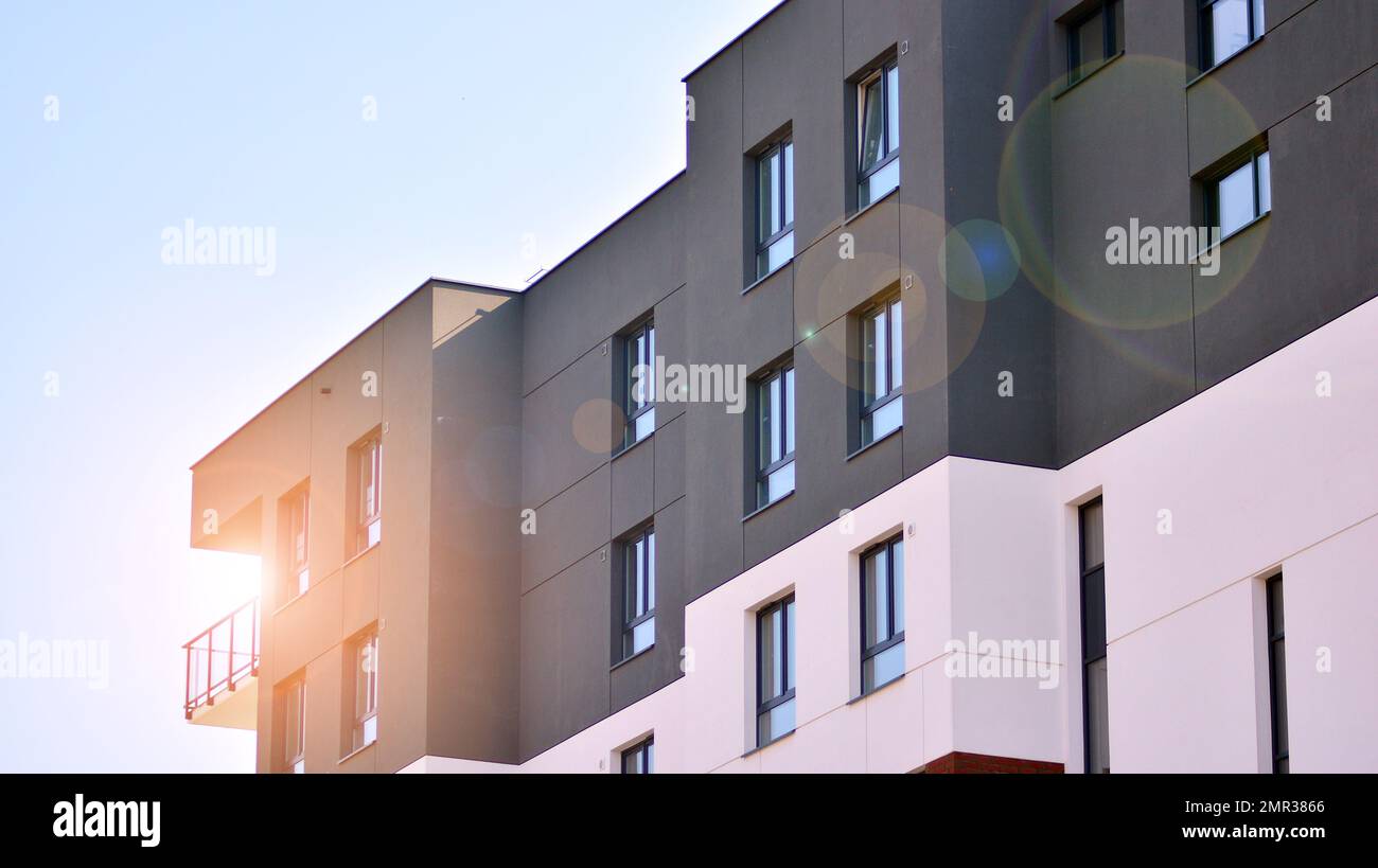 Futuristic square architecture of apartment building. Real estate with ...