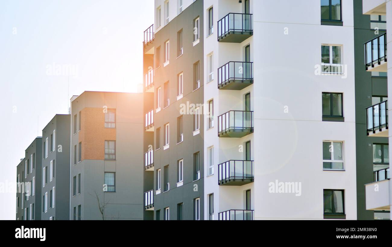 Futuristic square architecture of apartment building. Real estate with ...