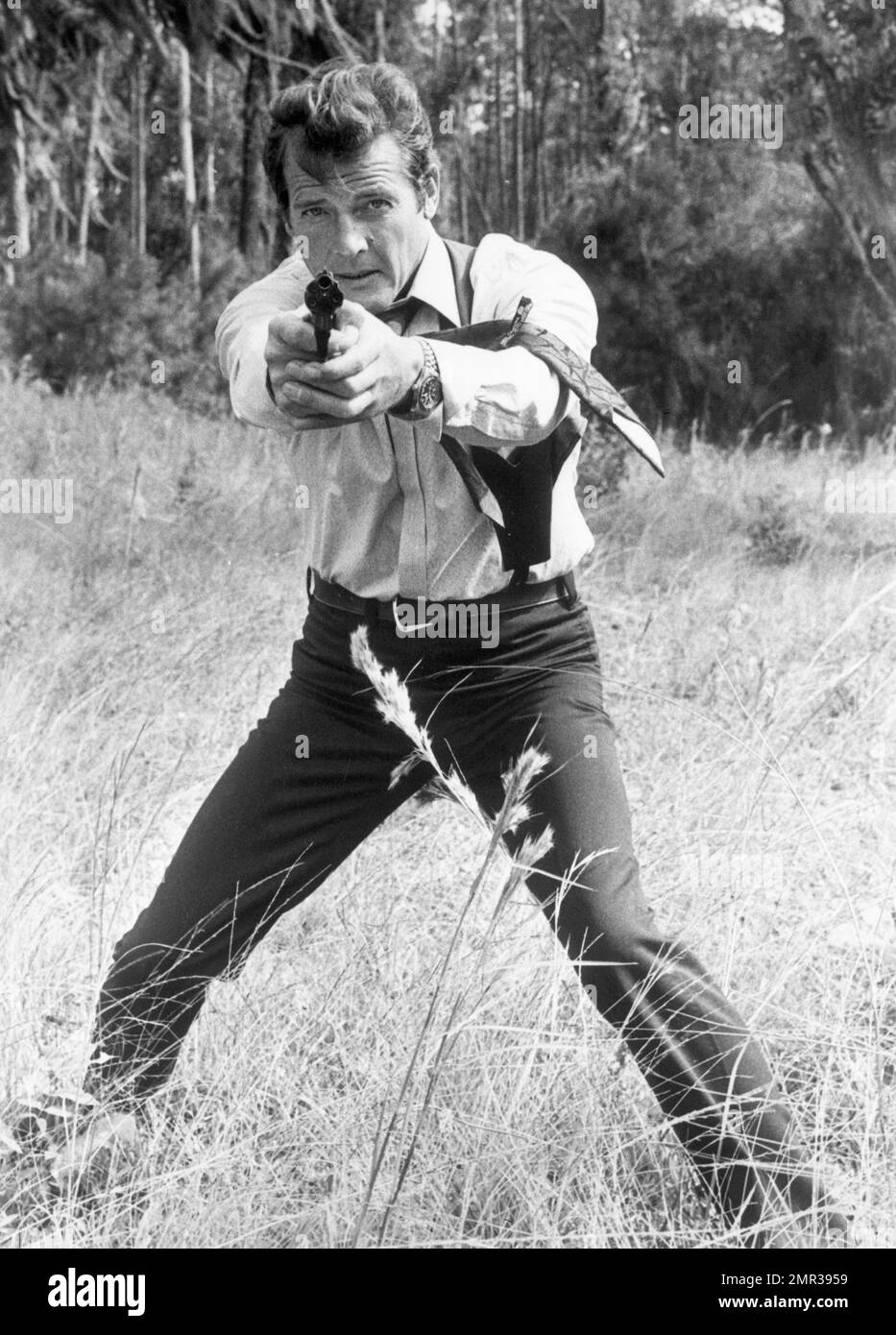 Screen actor Roger Moore poses as James Bond 007 around Oct. 30, 1972. (AP Photo/Robert Dear ...