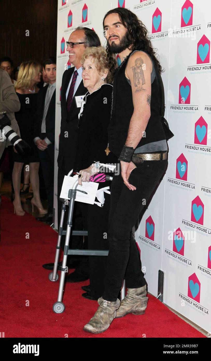 Russell Brand and Peggy Albrecht at the Friendly House LA Annual Awards ...