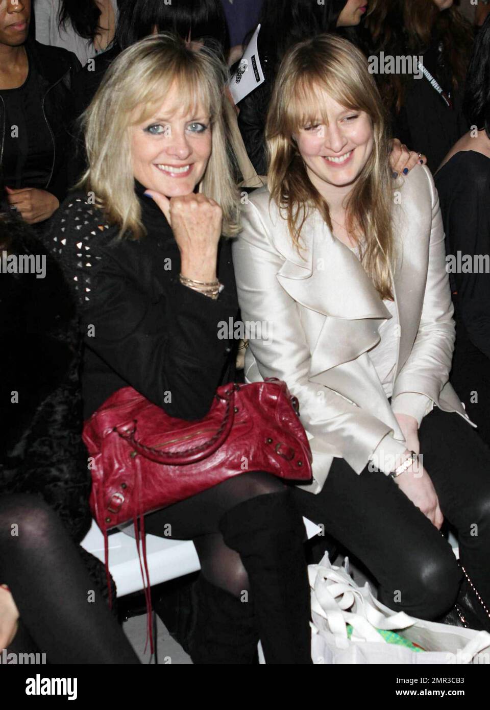 Twiggy Lawson and daughter Carly Lawson sit front row at the Bora Aksu ...