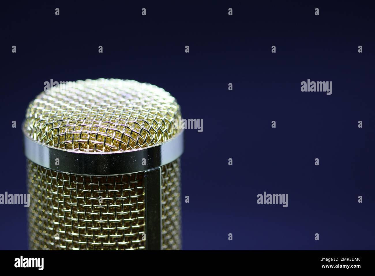 Condenser microphone with gold accents Stock Photo - Alamy