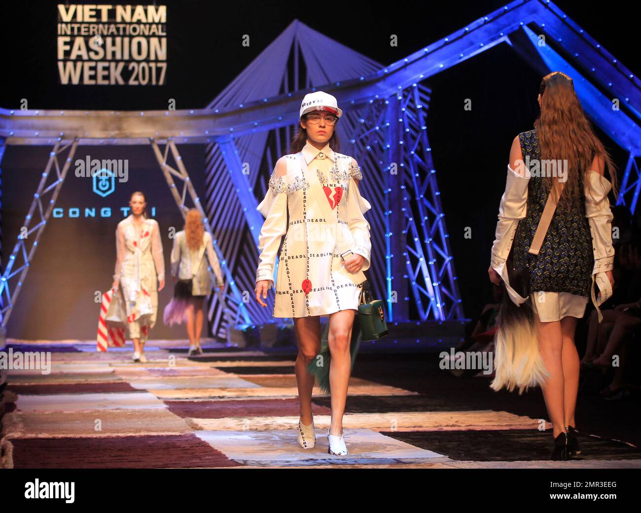 Models present creations by designer Nguyen Cong Tri during Vietnam ...