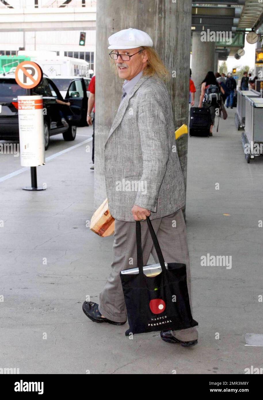 Comedian Gallagher runs late to catch his flight out, but still takes ...