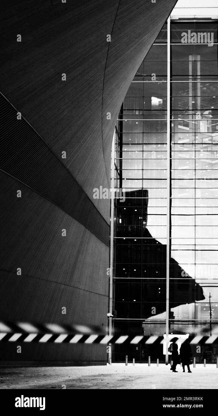 A vertical greyscale shot of the Helsinki Central Library Oodi, Finland ...