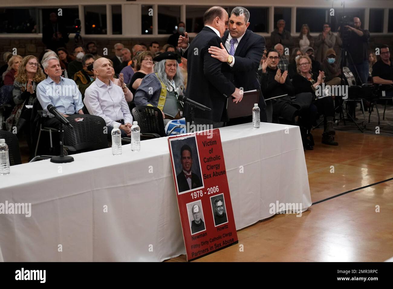 Pennsylvania House Speaker Mark Rozzi, center right, embraces Arthur ...