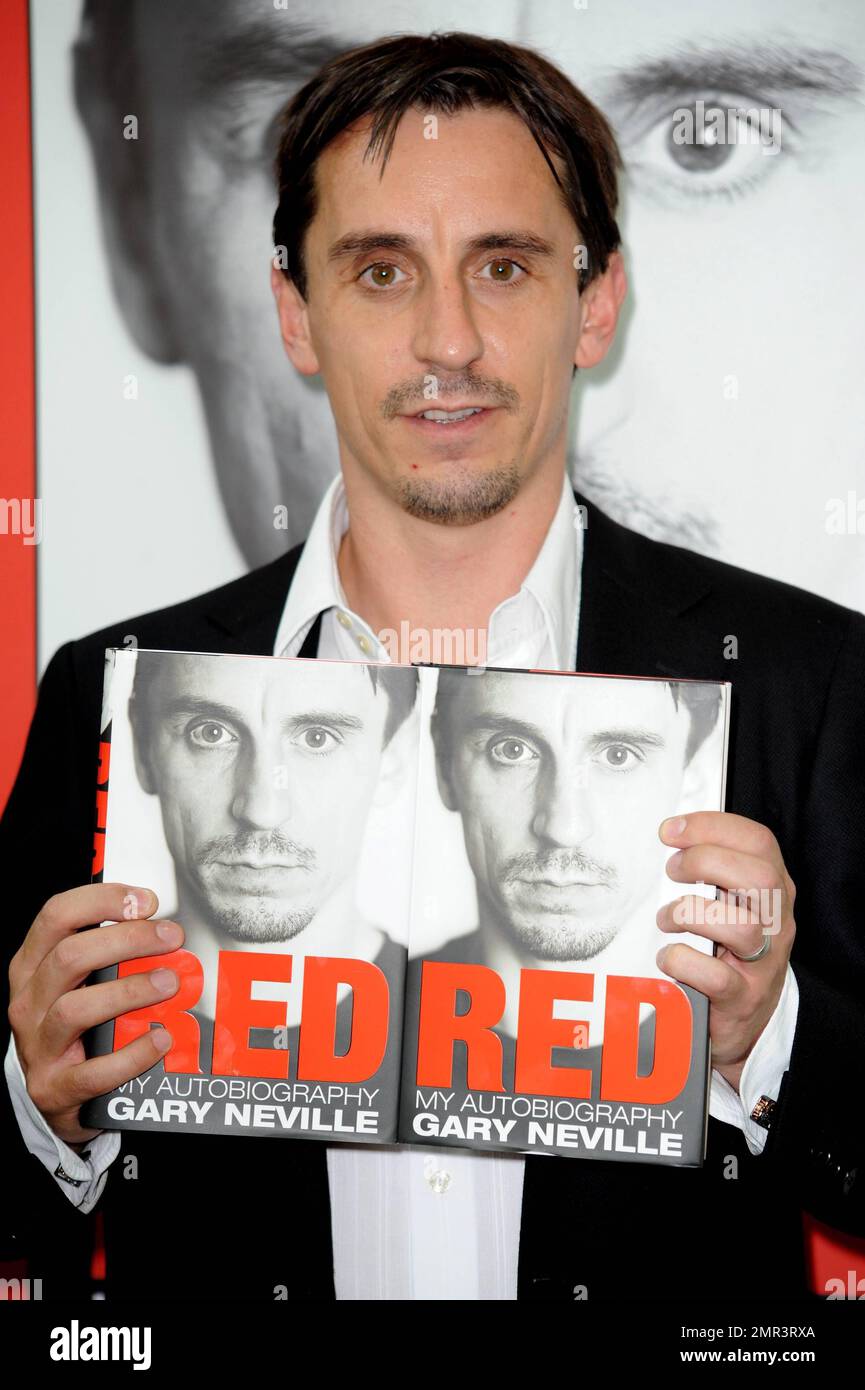 USA, CANADA, LATIN AMERICA AND GREECE ONLY - Gary Neville signs copies ...