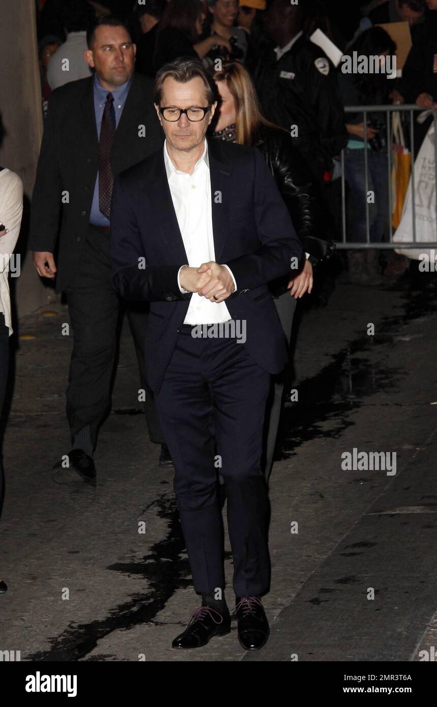 Recent Oscar nominee Gary Oldman signs autographs for fans outside the ...