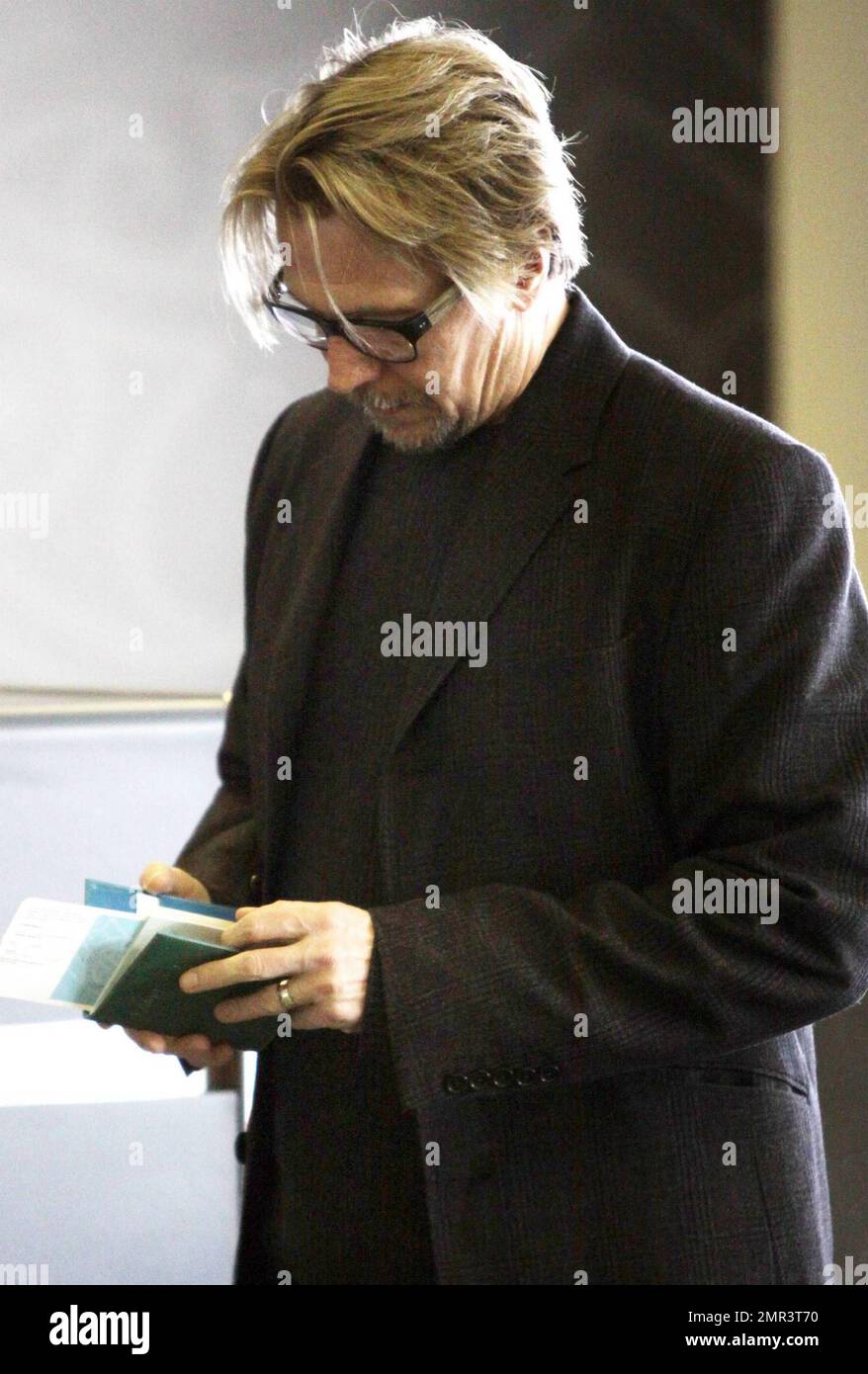 EXCLUSIVE!! English actor Gary Oldman checks in at LAX prior to his ...