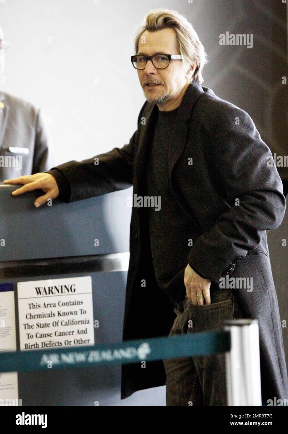 EXCLUSIVE!! English actor Gary Oldman checks in at LAX prior to his ...