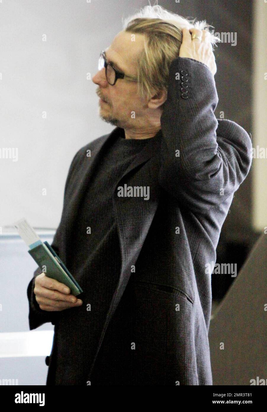 EXCLUSIVE!! English actor Gary Oldman checks in at LAX prior to his ...