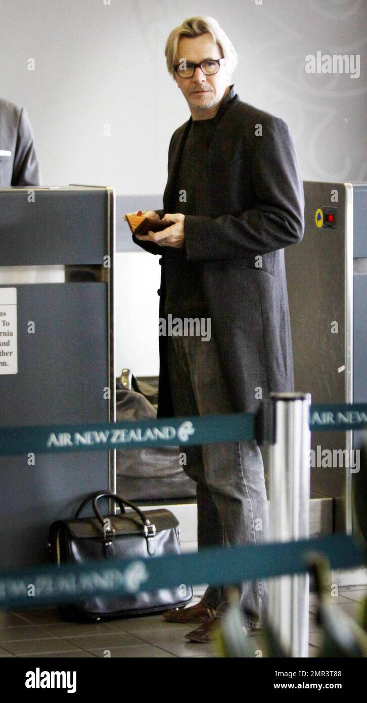 EXCLUSIVE!! English actor Gary Oldman checks in at LAX prior to his ...