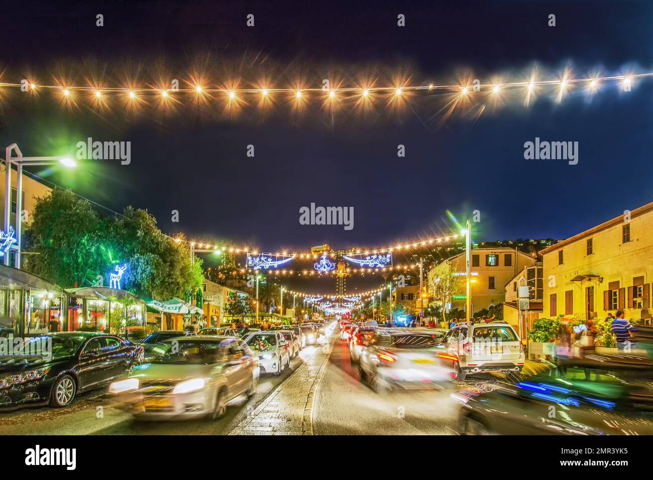 12-26-2014 Haifa. Street Night view of Ben Gurion street (sderot) next ...