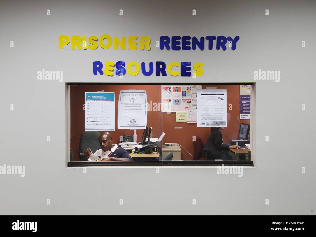 Bobby Hines talks with prisoner reentry resources personnel after ...