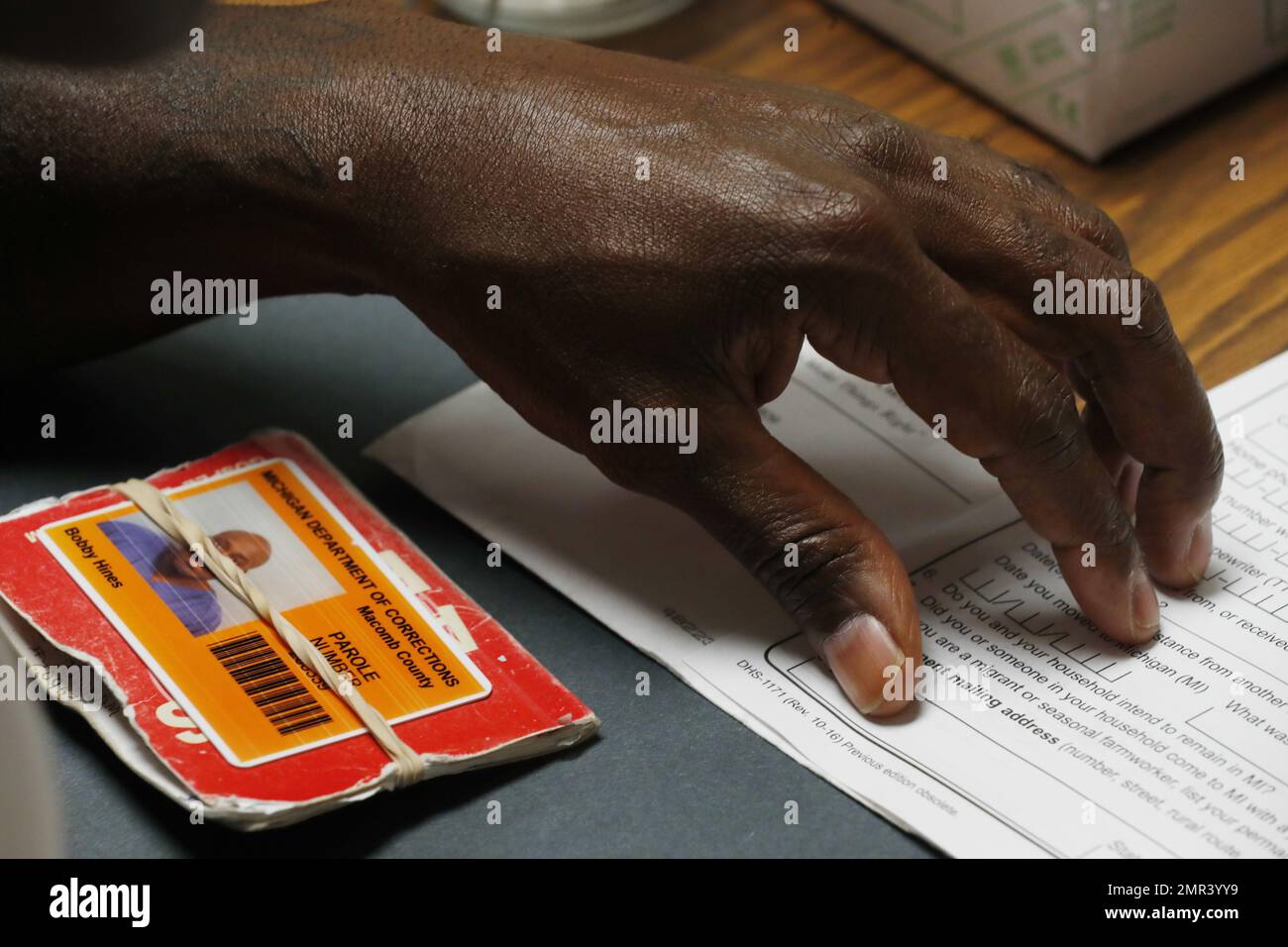 Bobby Hines speaks to his parole officer, Cyndi Izumi, in Detroit ...